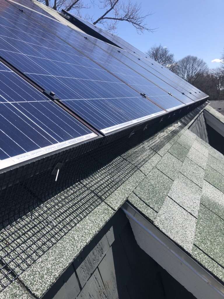 Professional installation of a critter guard.